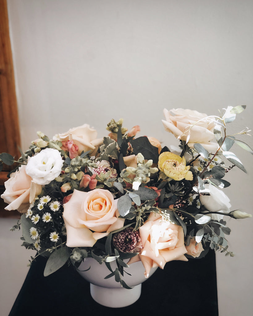 Floral arrangement in a contemporary white compote – GIA AND THE BLOOMS